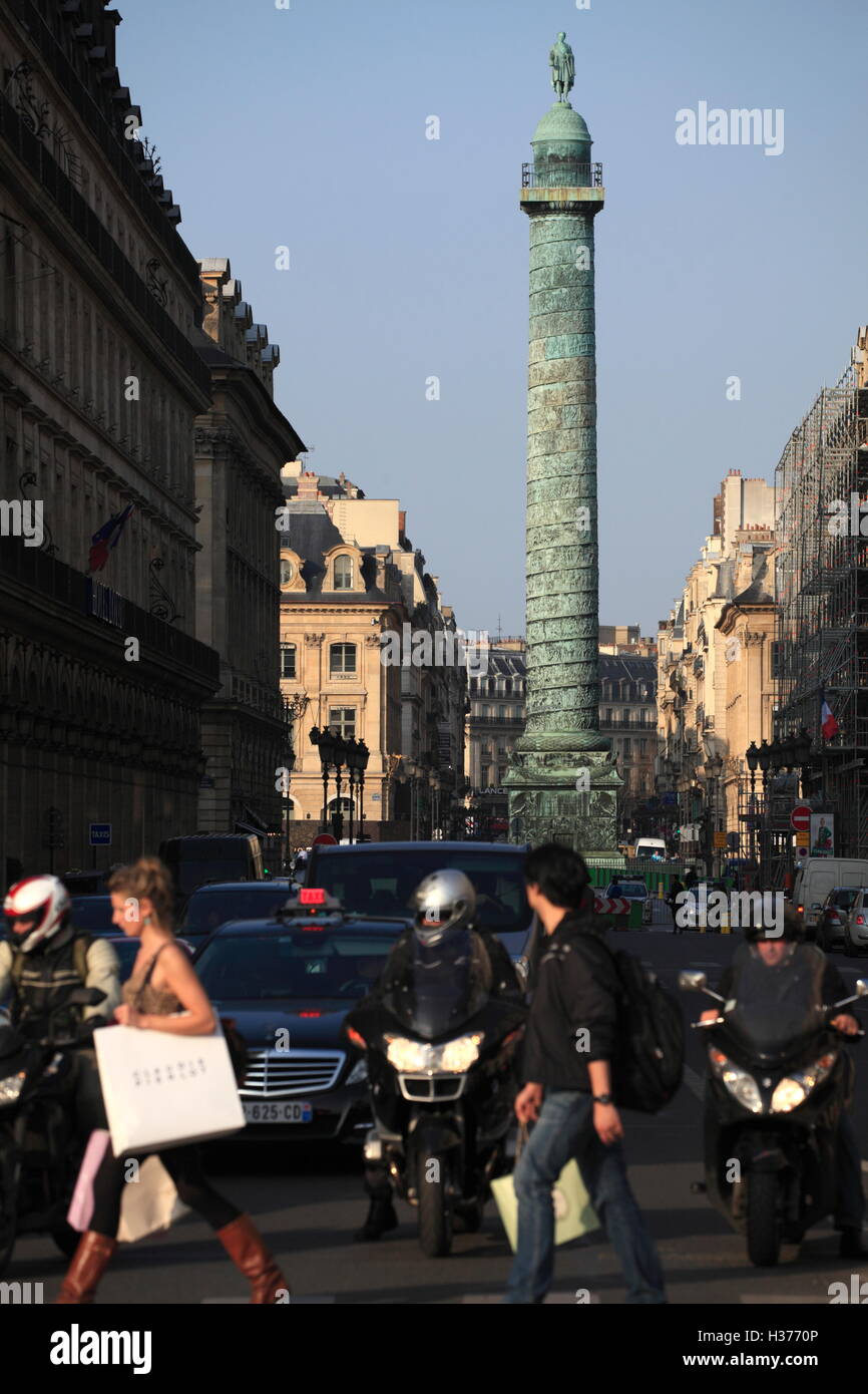 Traffics on the street with the Vendome Column in Place Vendome in the ...