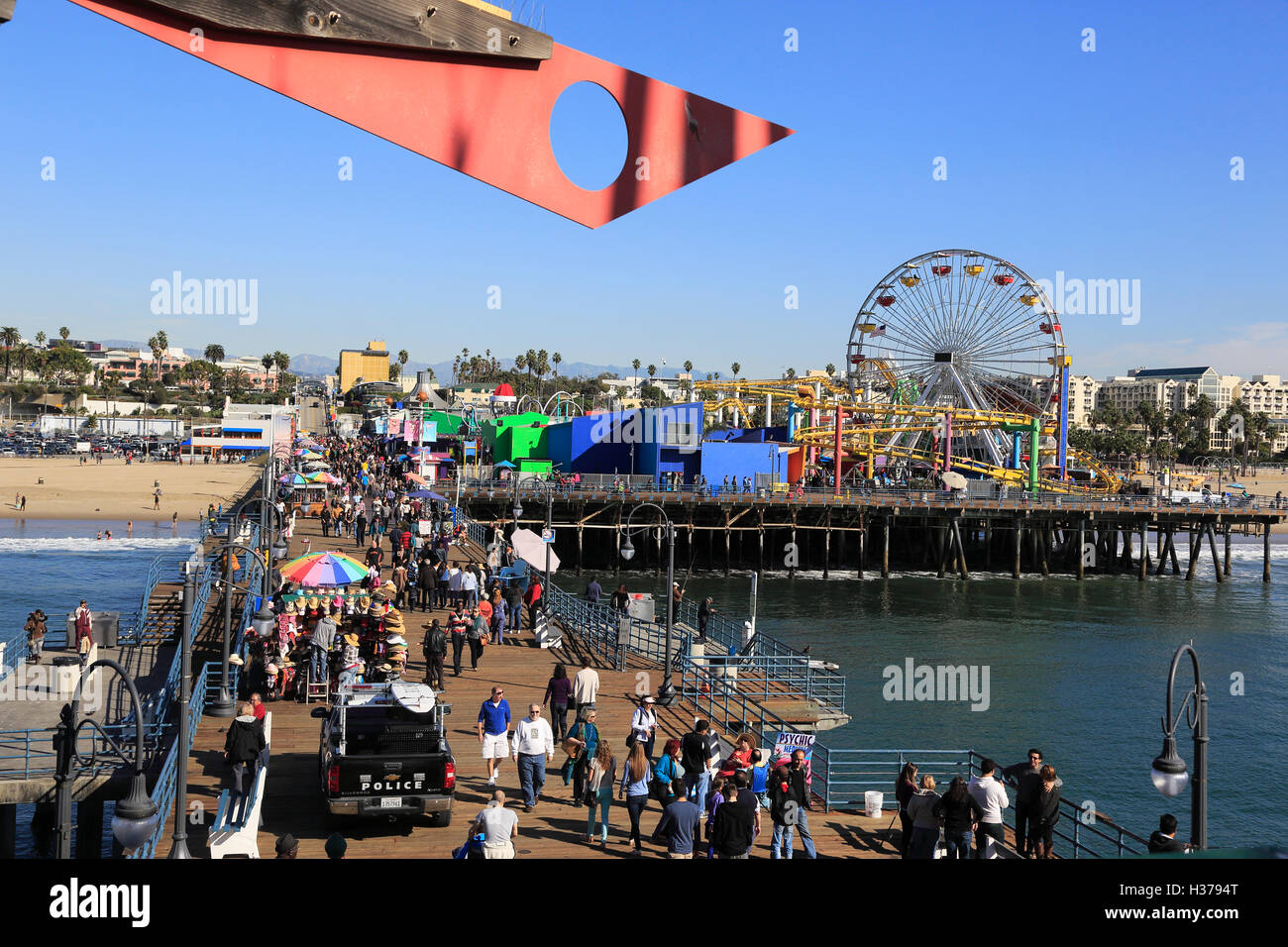 Santa Monica Pier with the ferris wheel of Pacific park amusement park ...