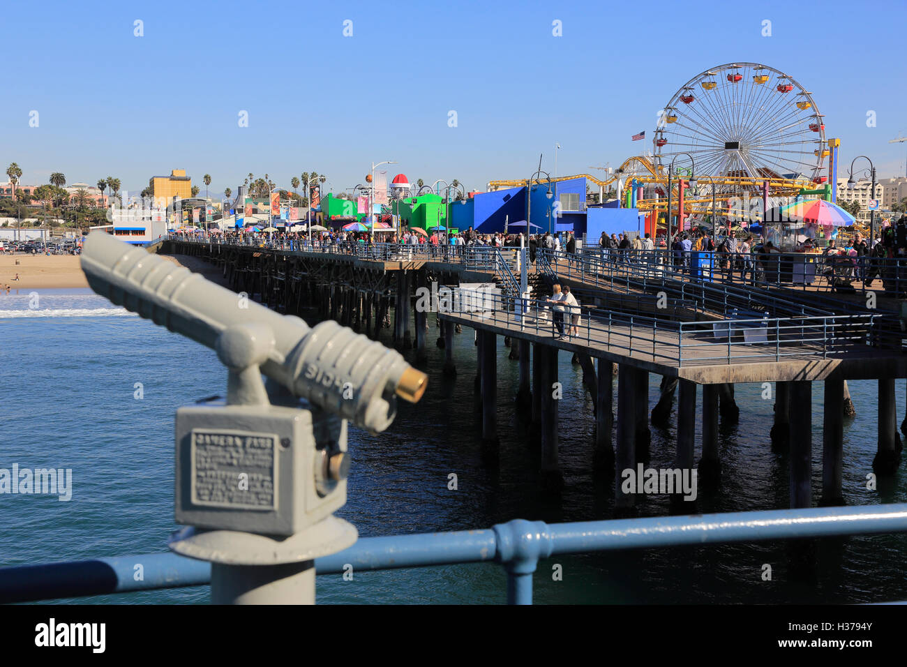 Santa Monica Pier with the ferris wheel of Pacific park amusement park ...