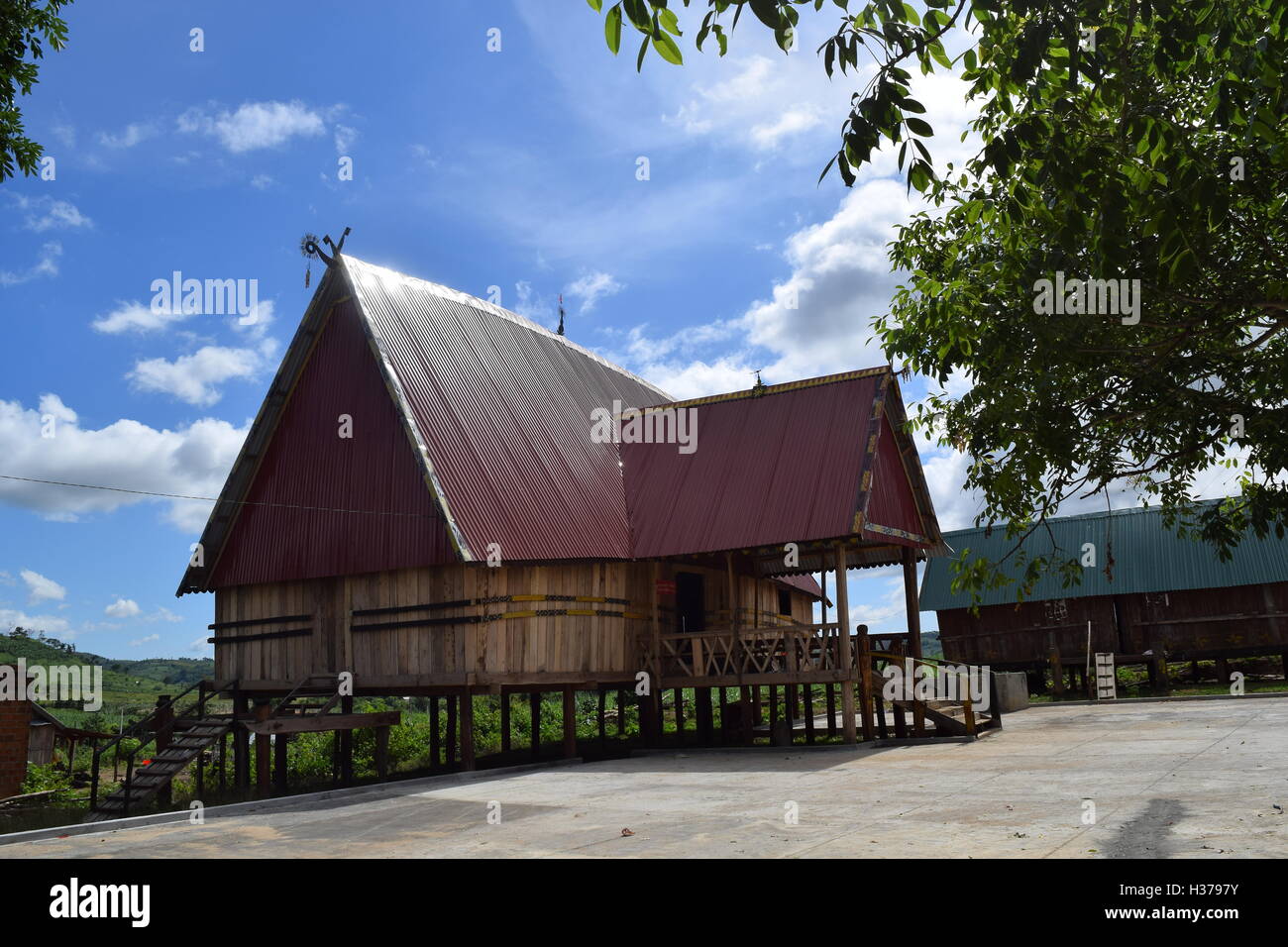 traditional Rong house in ethnic villages in highland Vietnam. This ...