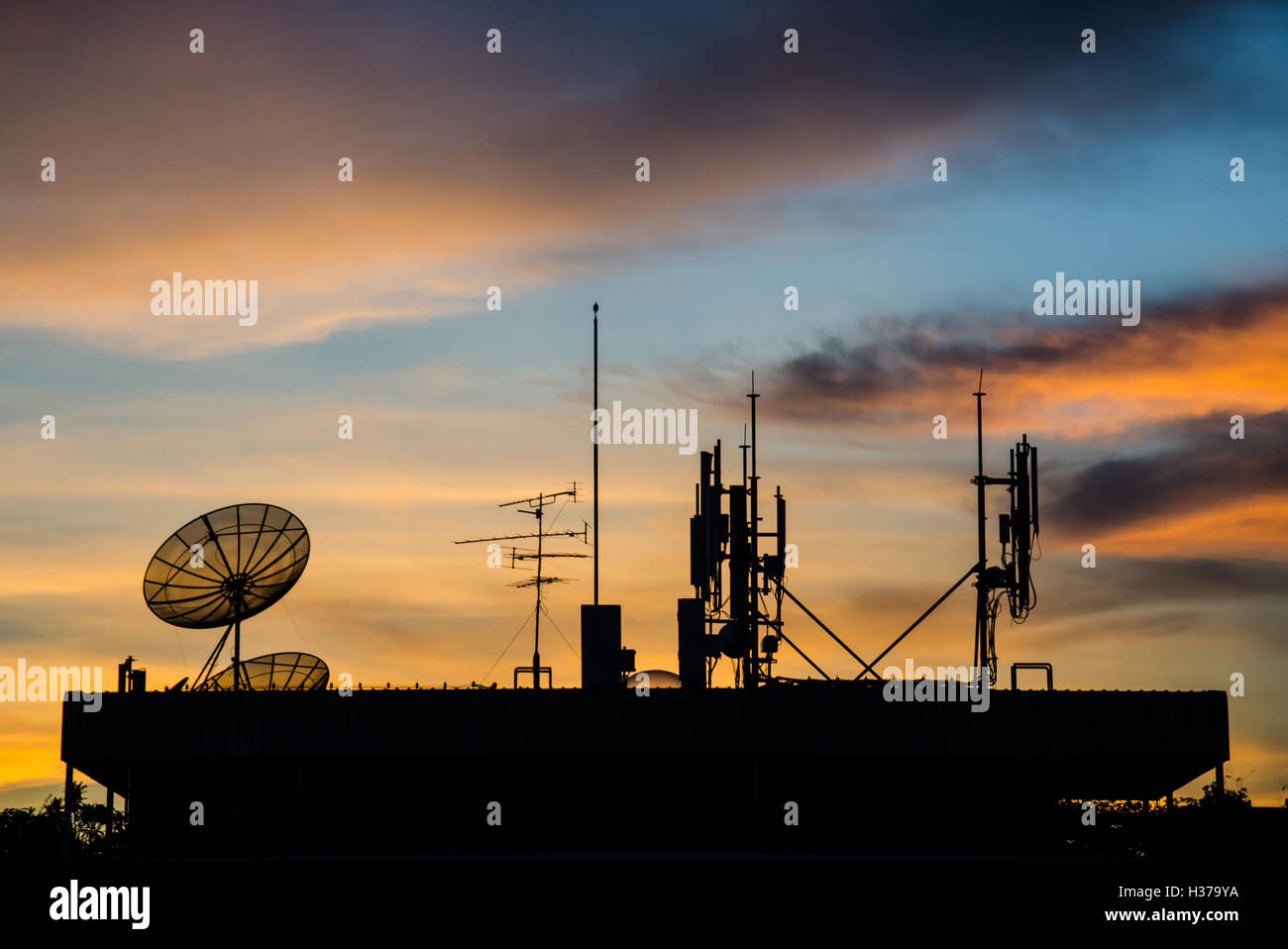 Satellite dish and Telecom tower Stock Photo - Alamy