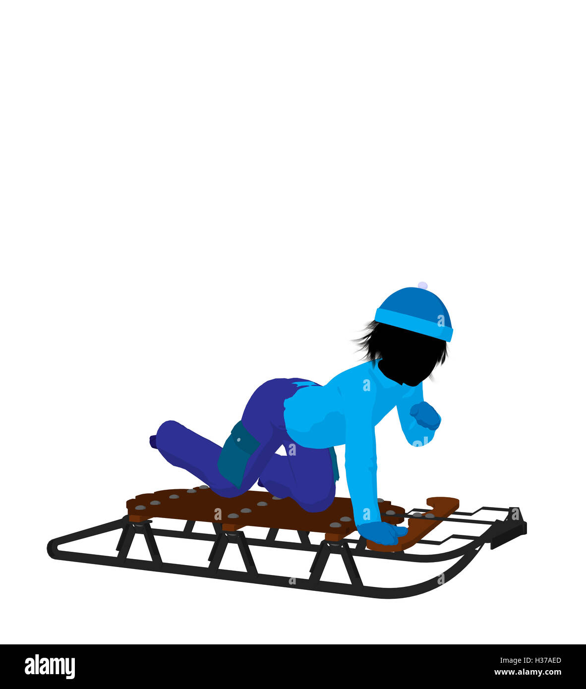 Boy on a sledge Cut Out Stock Images & Pictures - Alamy