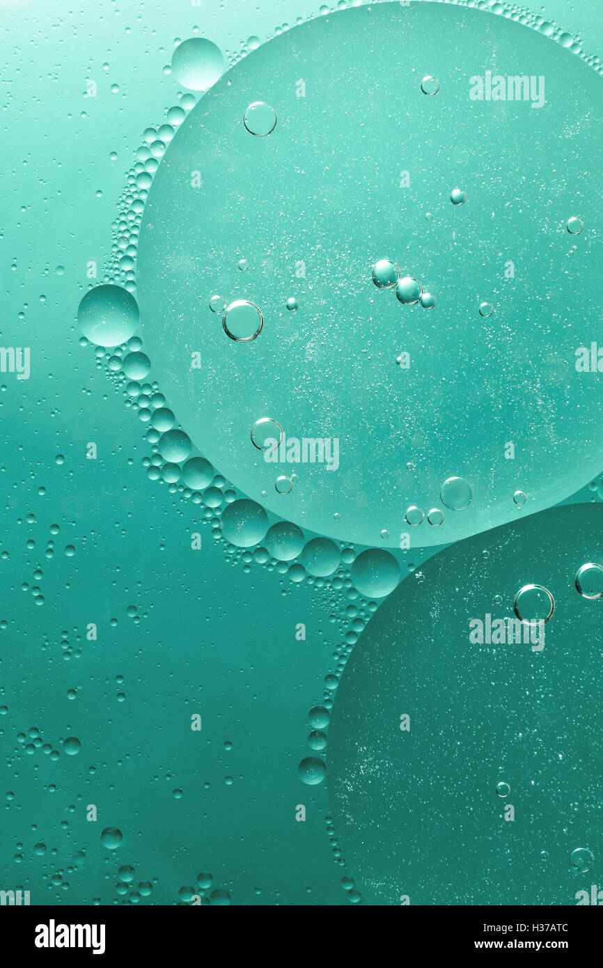 Green abstract of oil droplet. Vertically Stock Photo - Alamy