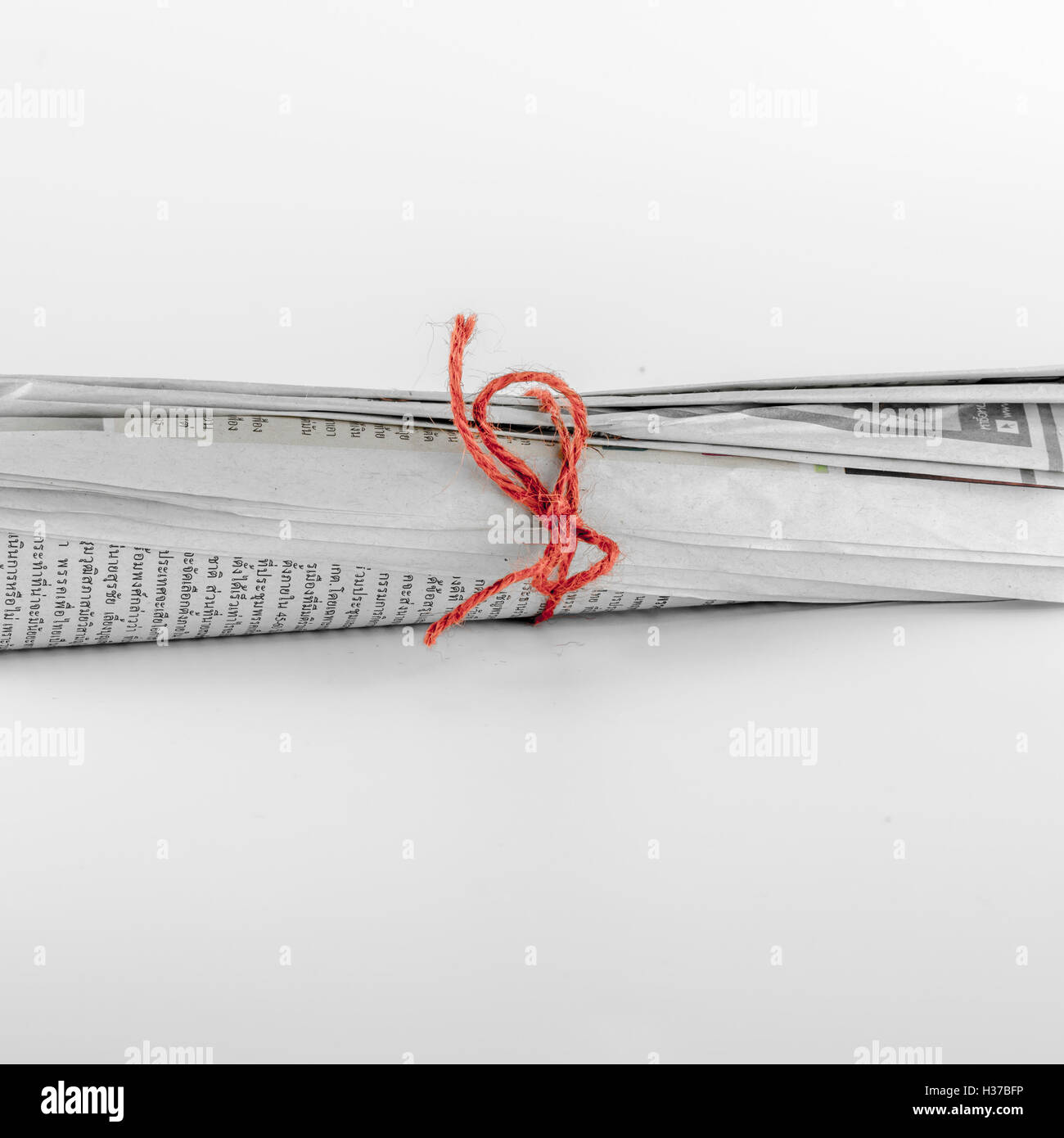 Rolled up newspaper hi-res stock photography and images - Alamy