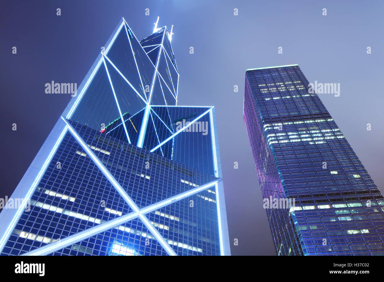 Modern skyscraper at night Stock Photo - Alamy