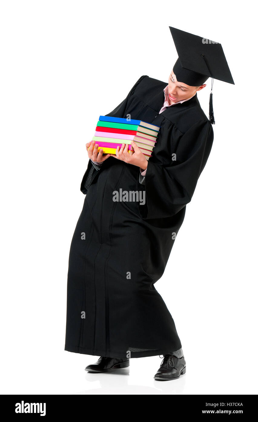 Graduation man carrying heavy books Stock Photo - Alamy