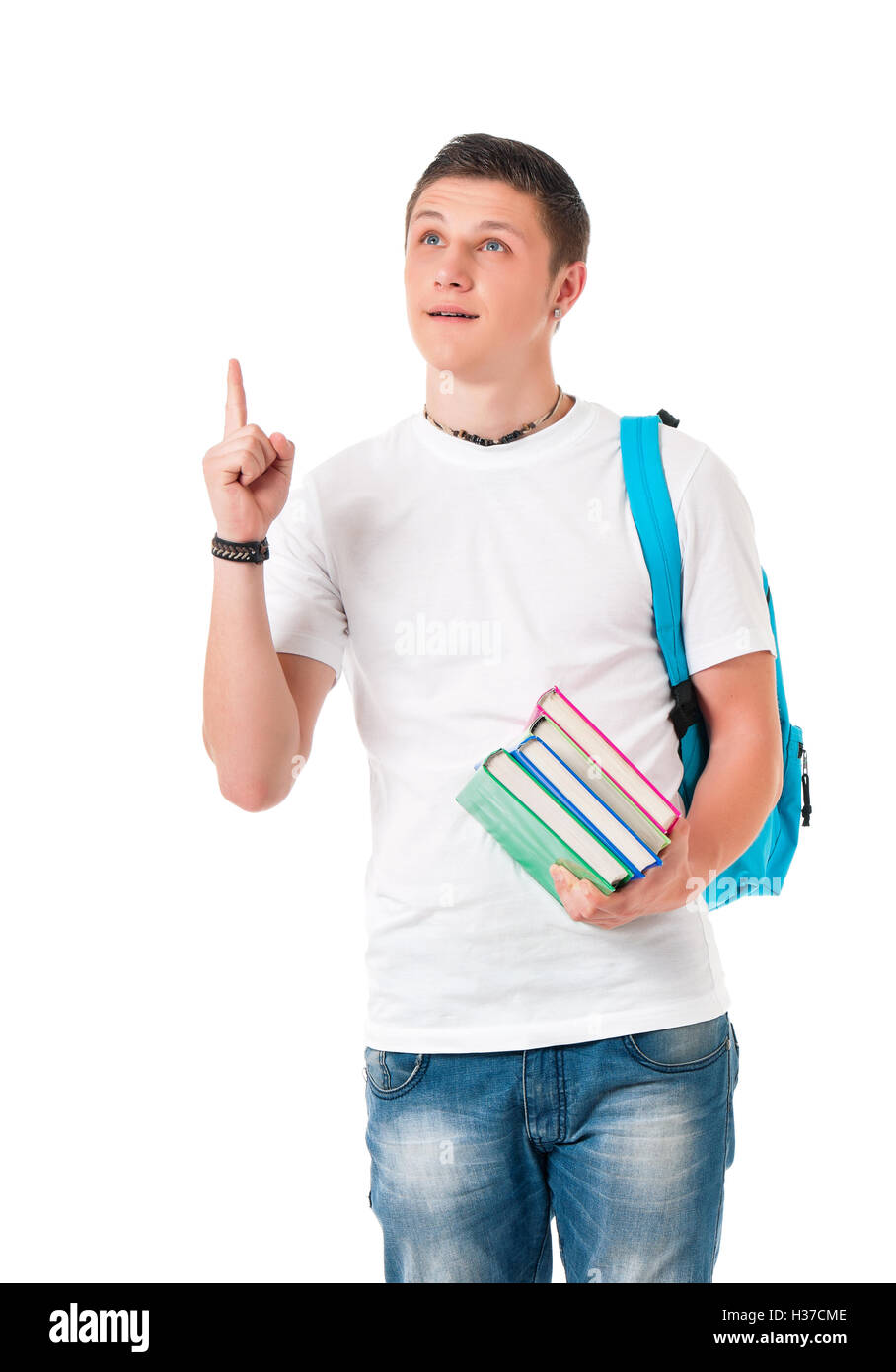 Student boy with books and a backpack Stock Photo - Alamy