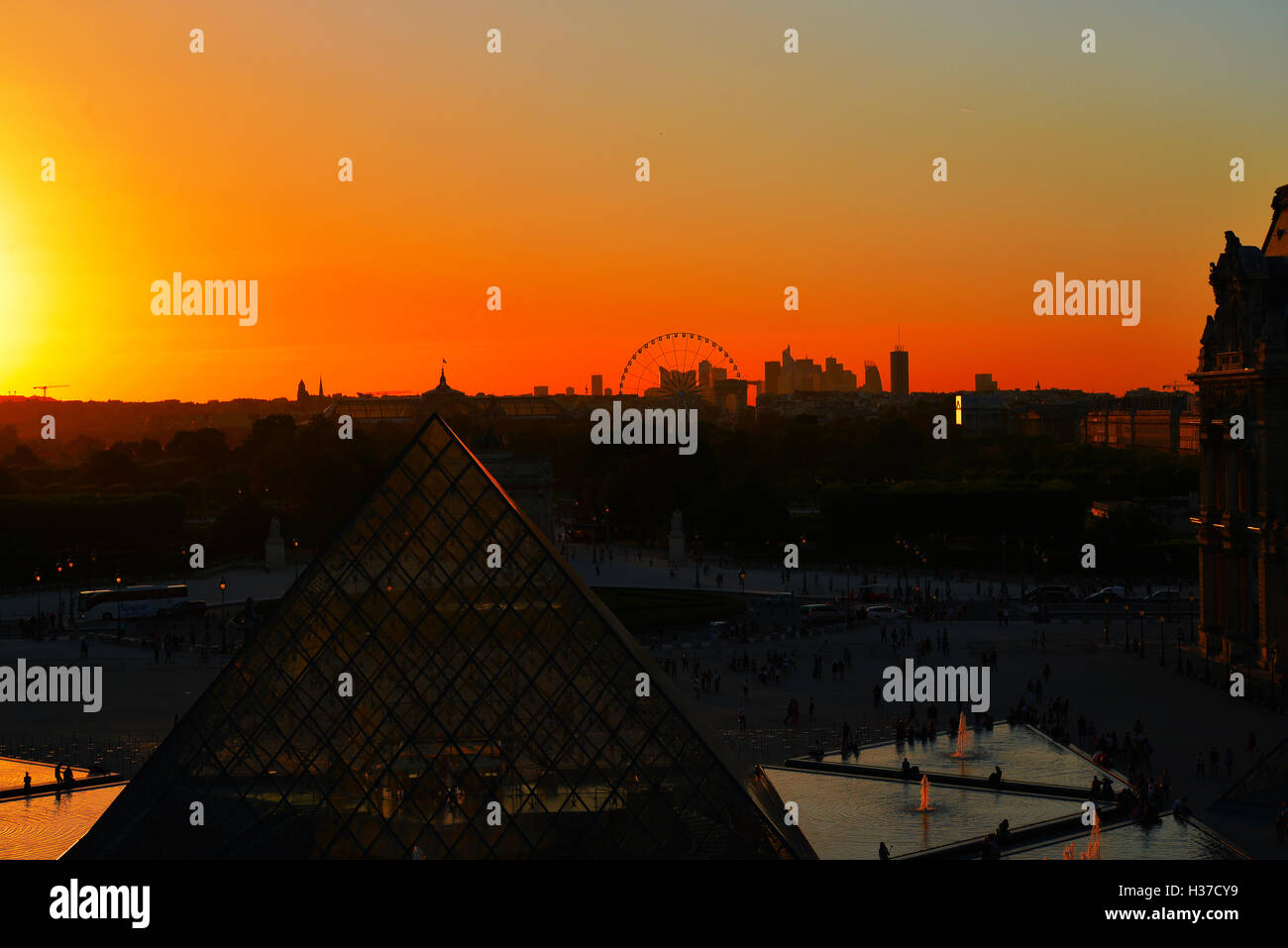 Paris' panorama and sunset from the Louvre Museum Stock Photo - Alamy