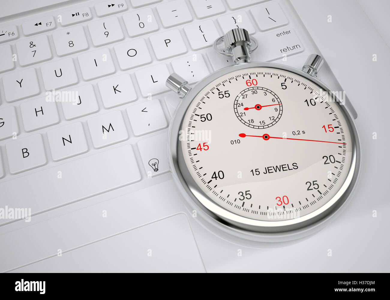 Sports stopwatch lying on a computer keyboard Stock Photo - Alamy