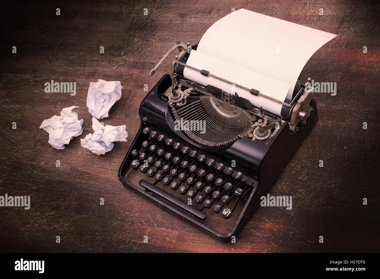Vintage typewriter and old books Stock Photo - Alamy