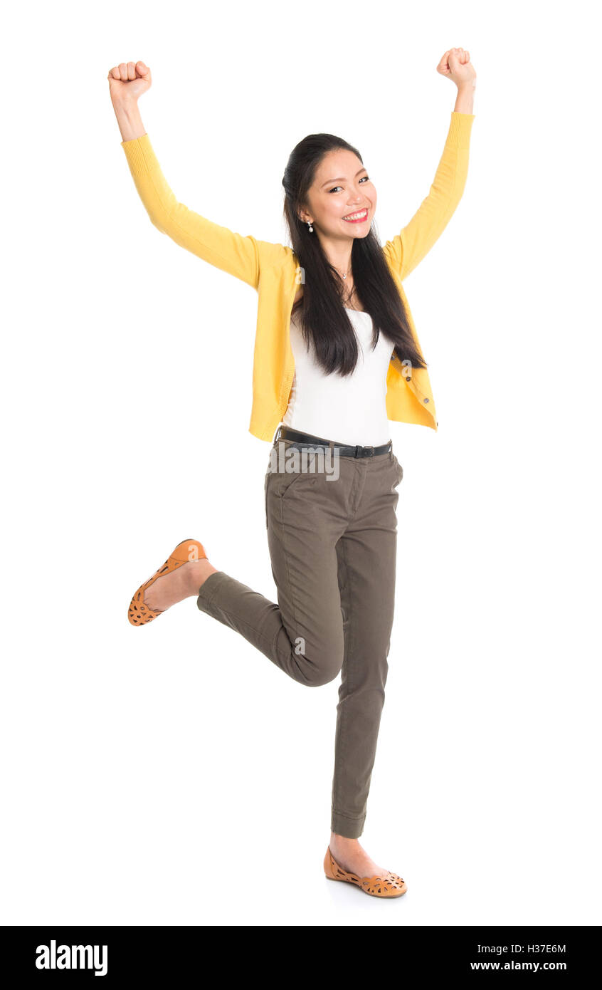 Asian woman jumping Stock Photo - Alamy