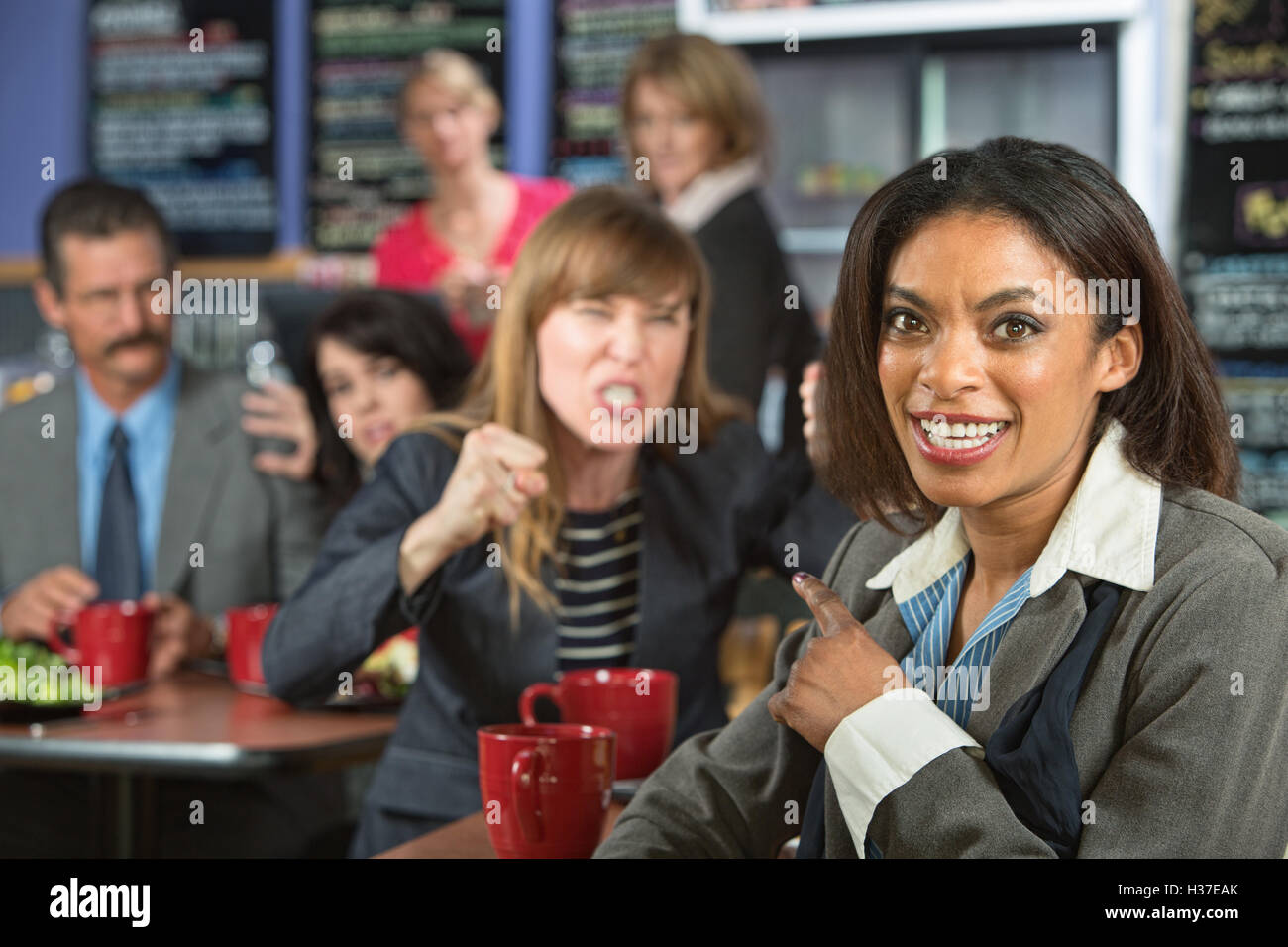 Lady Pointing at Angry Person Stock Photo - Alamy