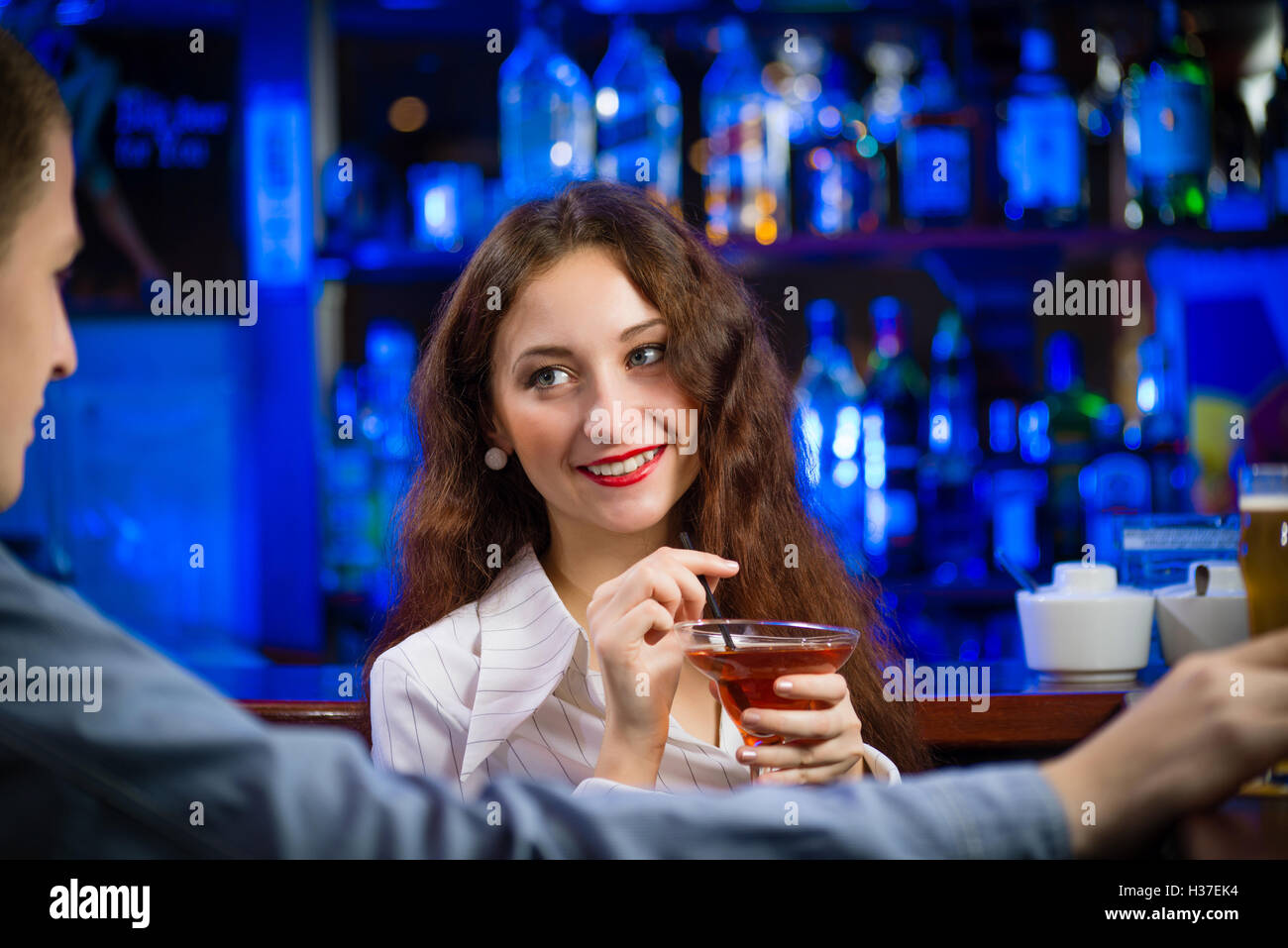 young woman in a bar Stock Photo - Alamy