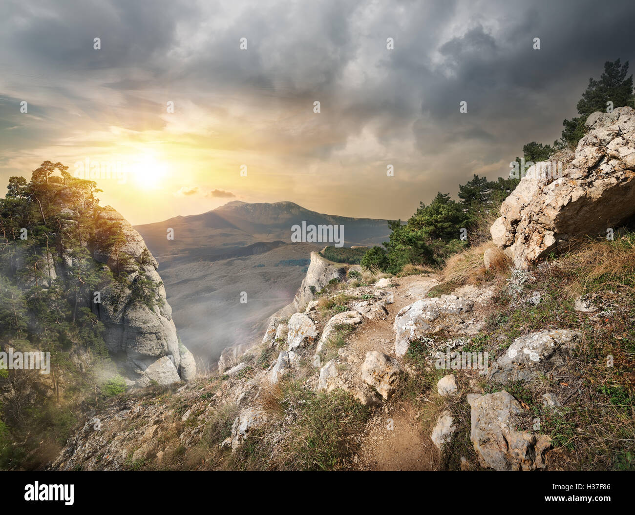 High rocks and clouds Stock Photo - Alamy