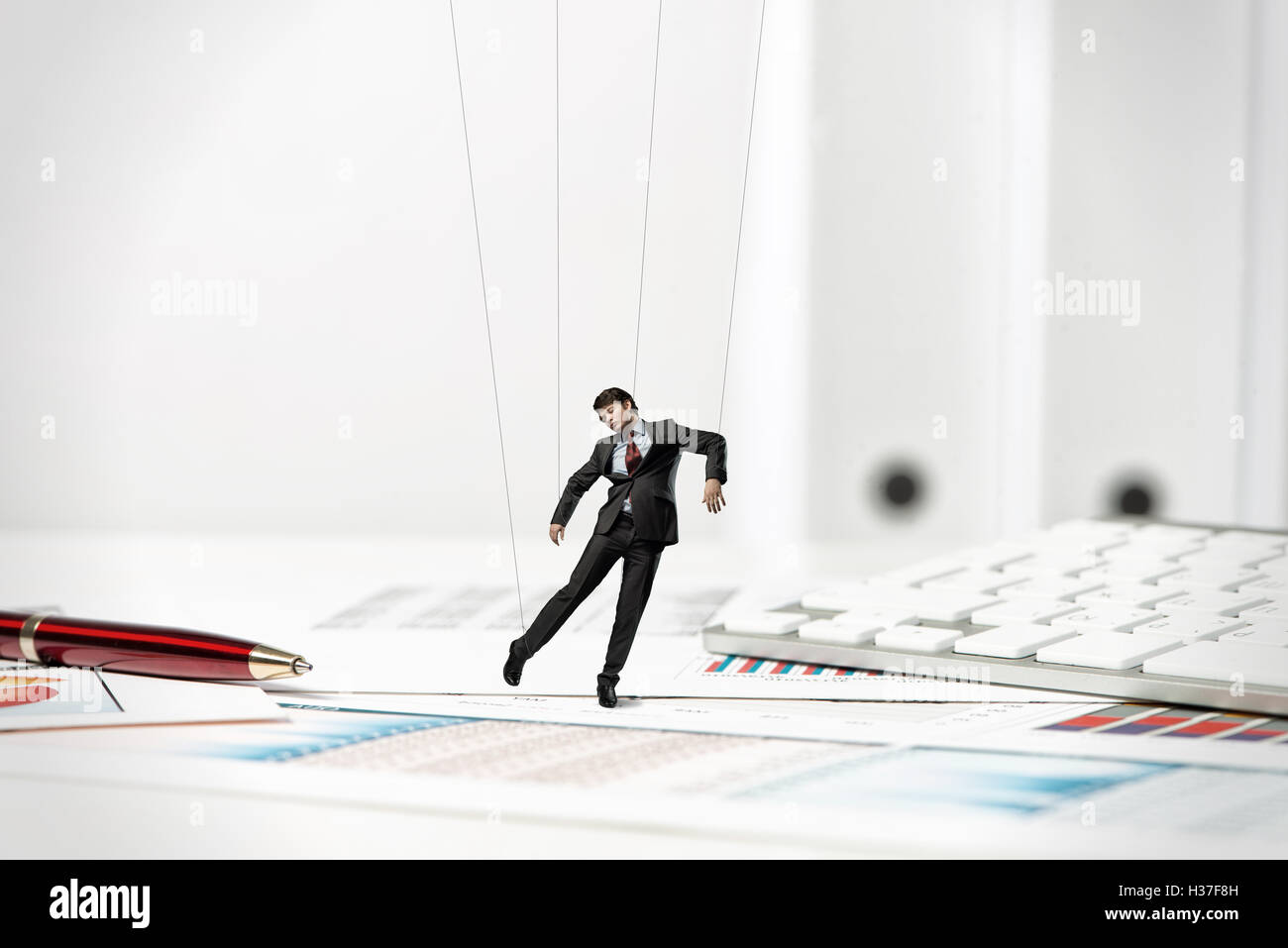 businessman puppet doll is on the desk Stock Photo - Alamy
