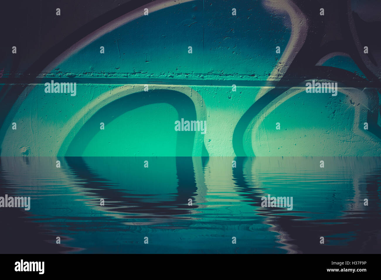 Graffiti reflection in the water, artistic chrome letters Stock Photo ...