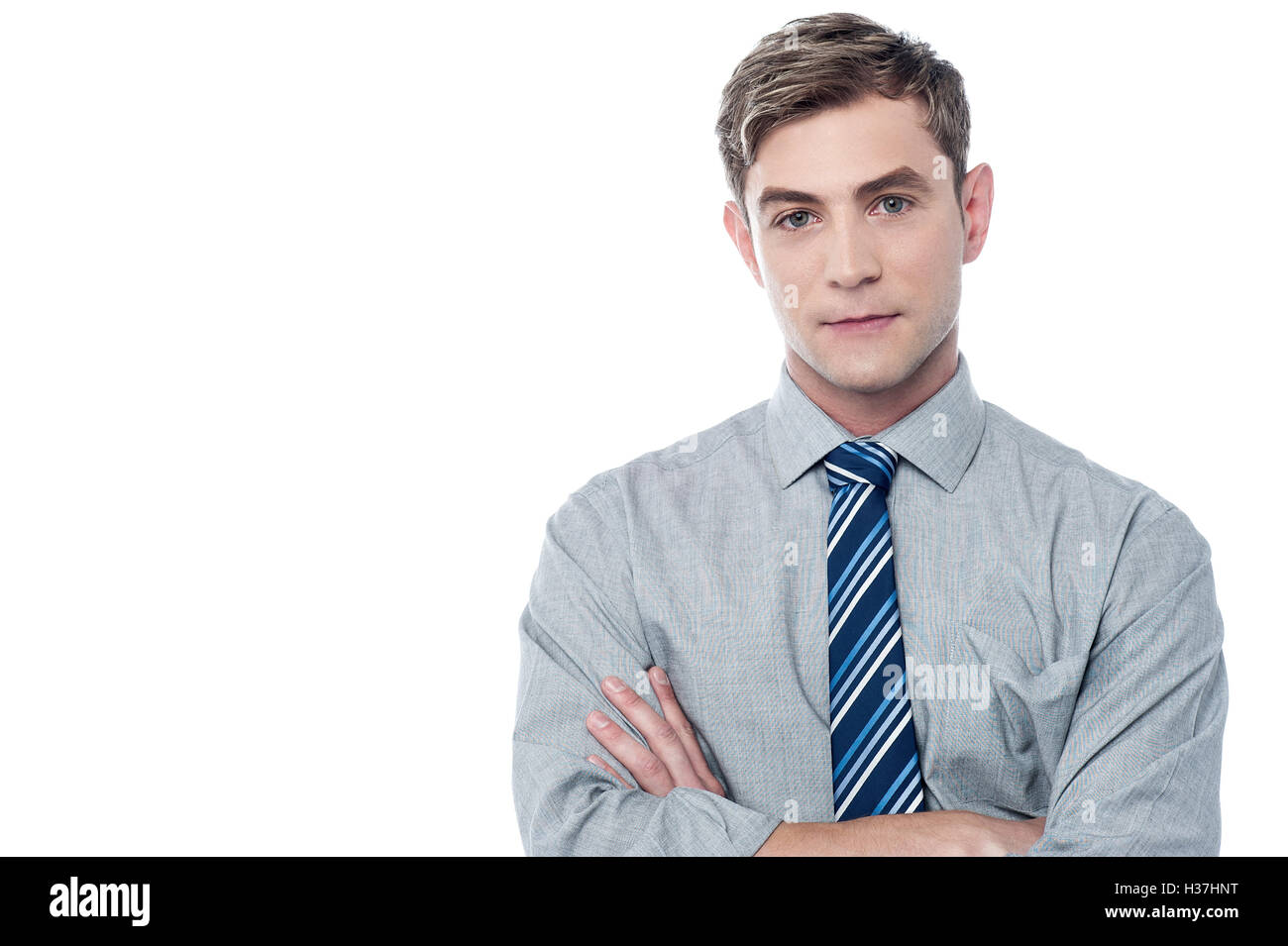 Young businessman isolated on white Stock Photo - Alamy
