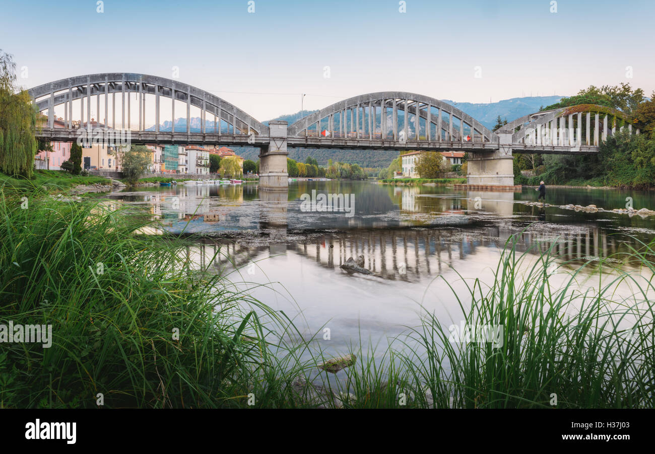 Bridge with reflection on Lake Adda, Italy Stock Photo - Alamy