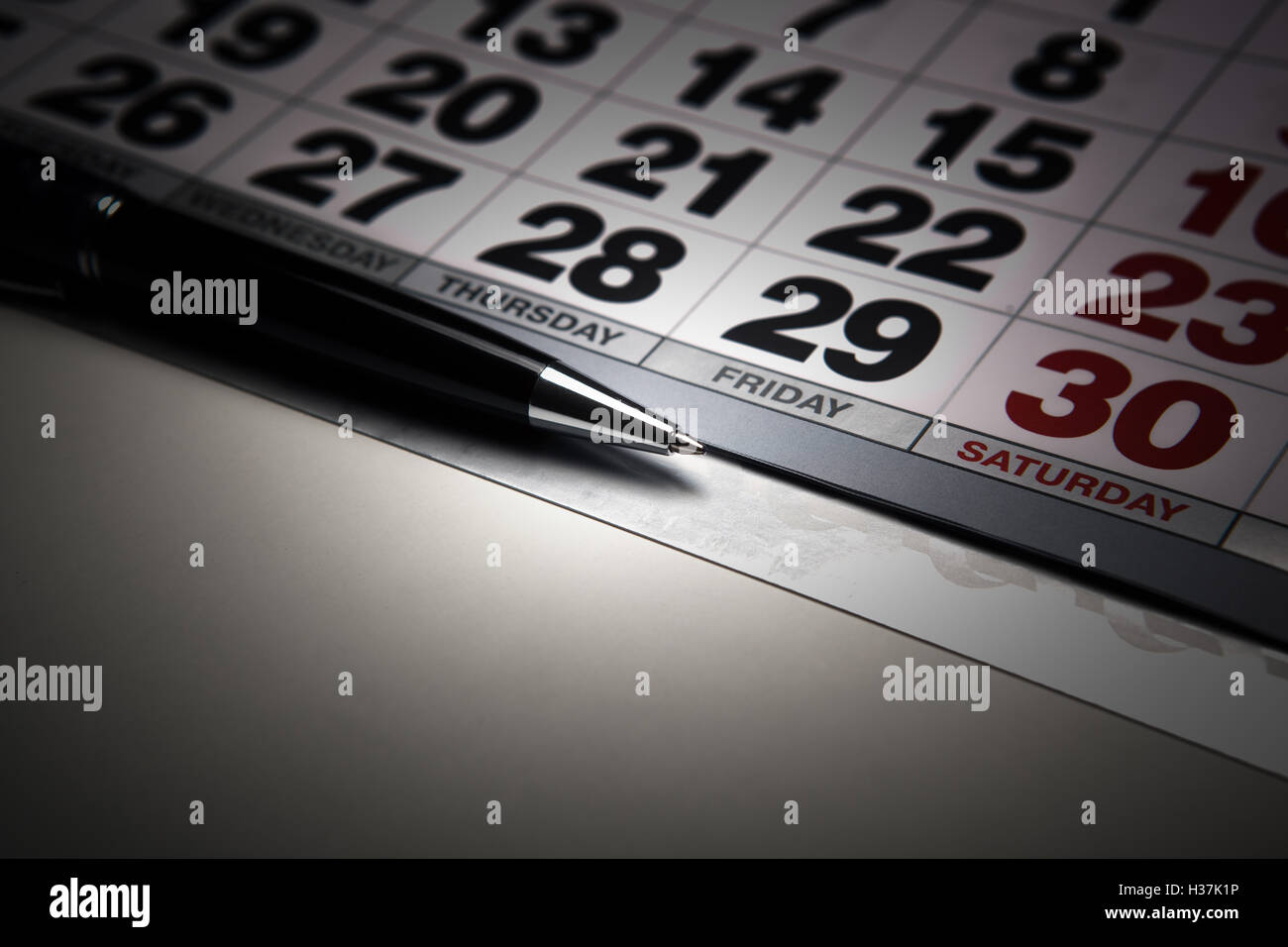 wall calendar with pen closeup Stock Photo - Alamy
