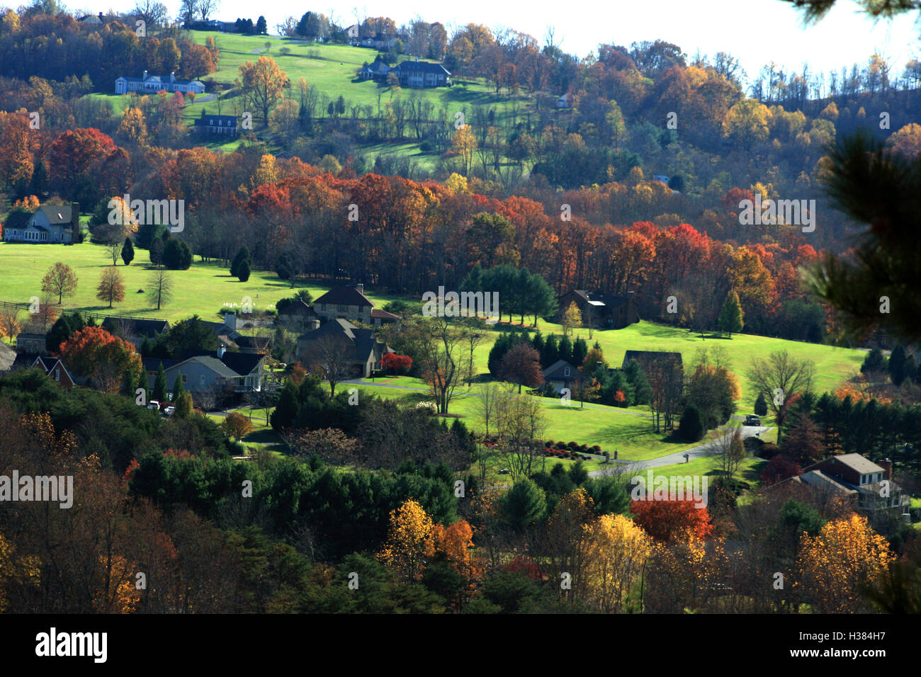 Virginia, USA. Landscape with houses, hills and woods in autumn colors ...