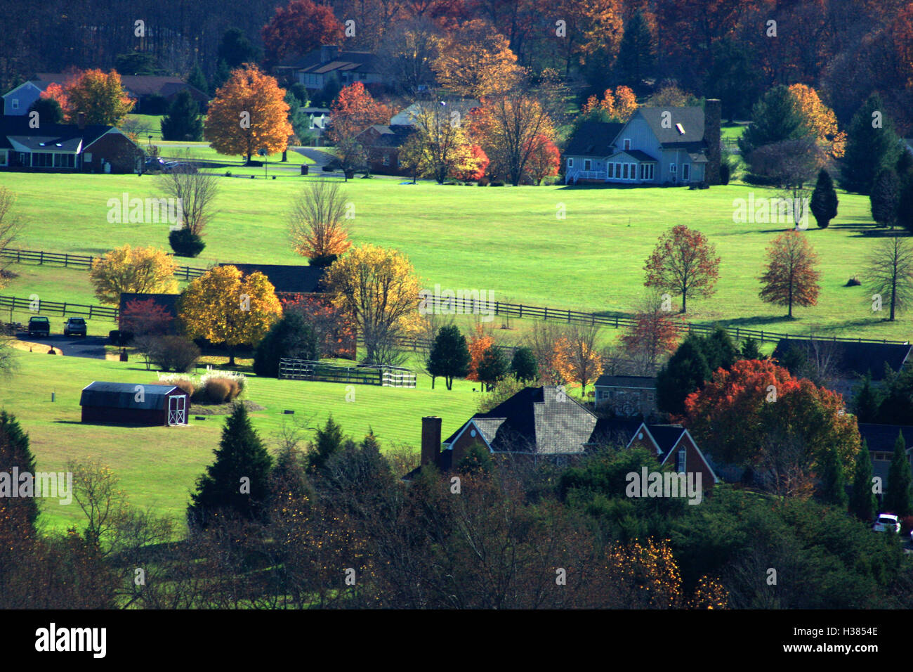 Virginia, USA. Landscape with houses, hills and woods in autumn colors ...