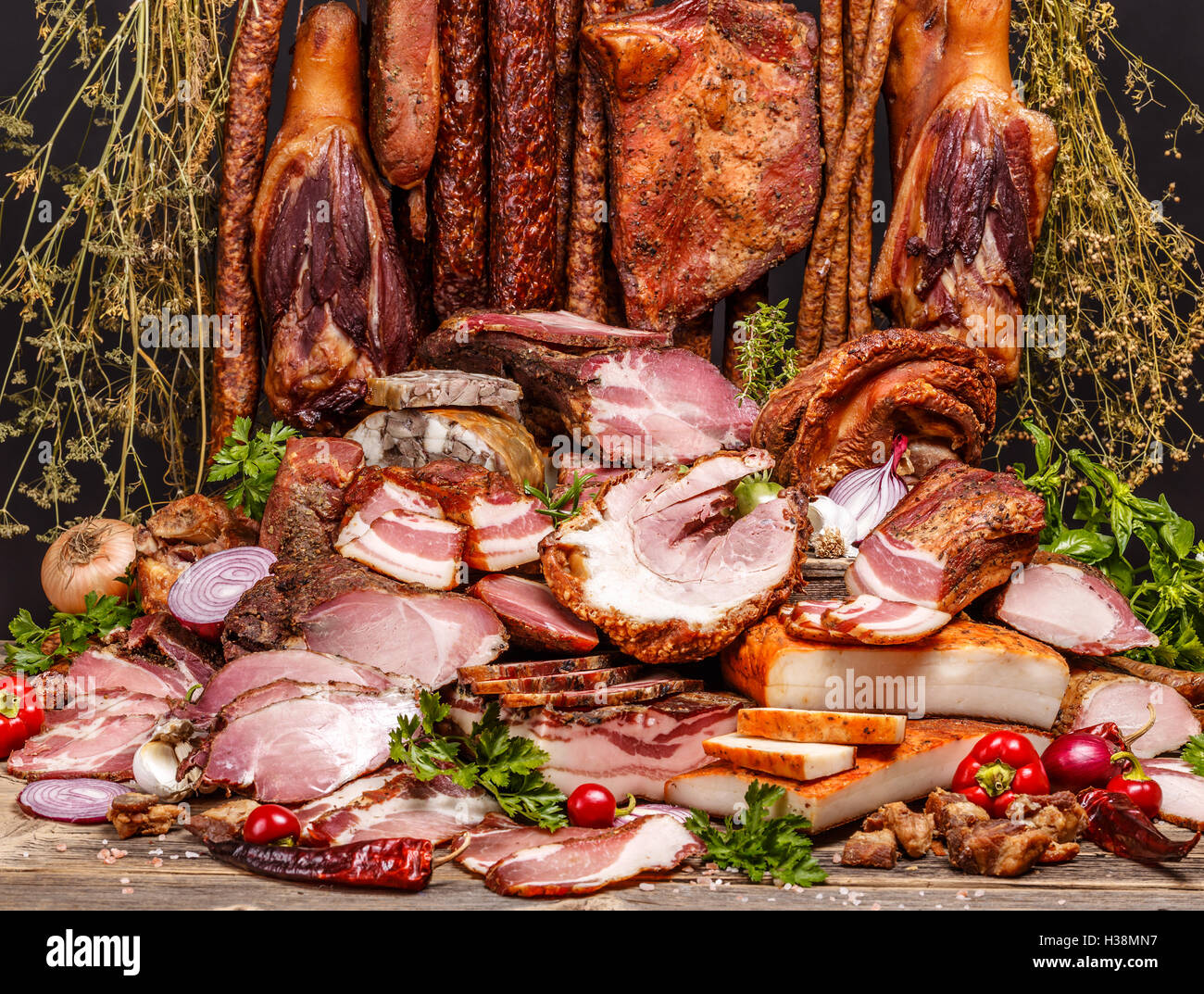 Various smoked pork meat, salami and sausages, still life Stock Photo ...