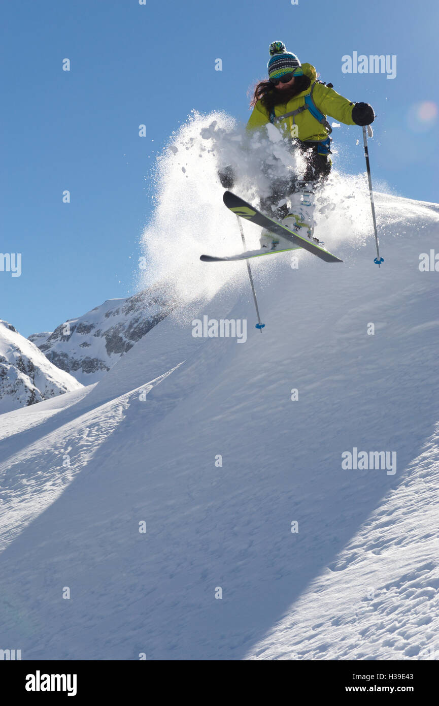 Woman powder skiing hi-res stock photography and images - Alamy