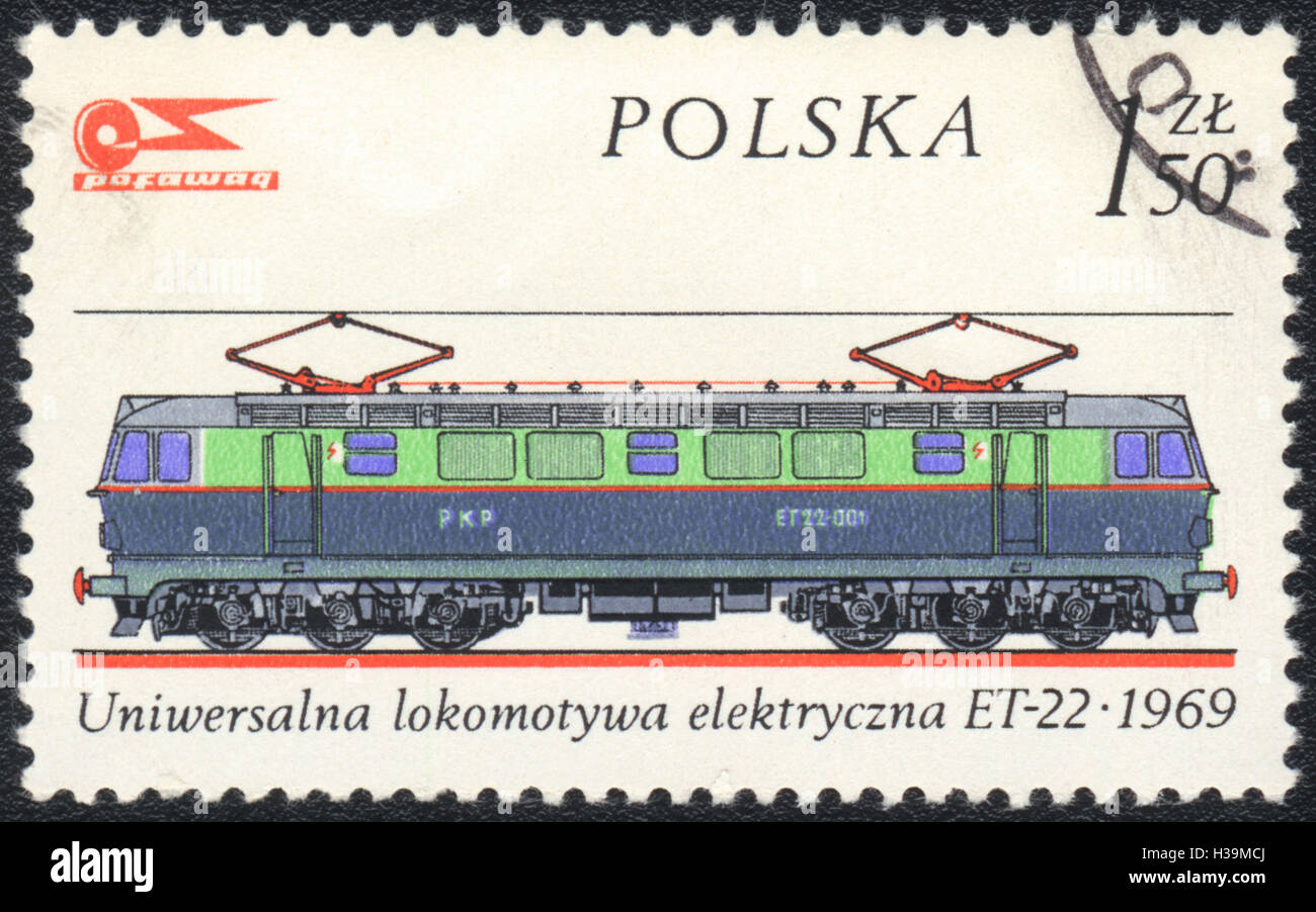 A postage stamp printed in Poland, shows Universal electric locomotive ...