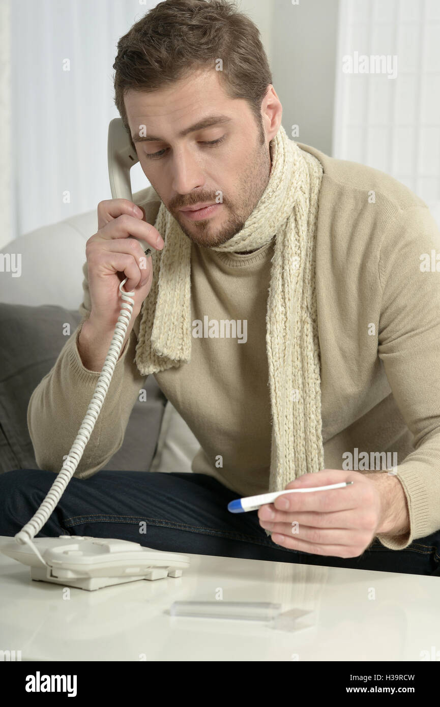 sick man calling his doctor Stock Photo - Alamy