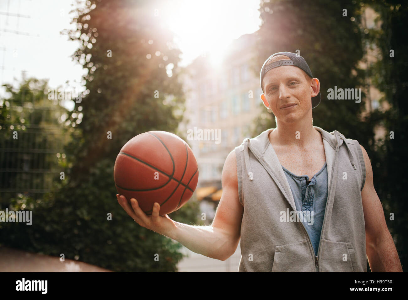 Basketball man standing hi-res stock photography and images - Alamy