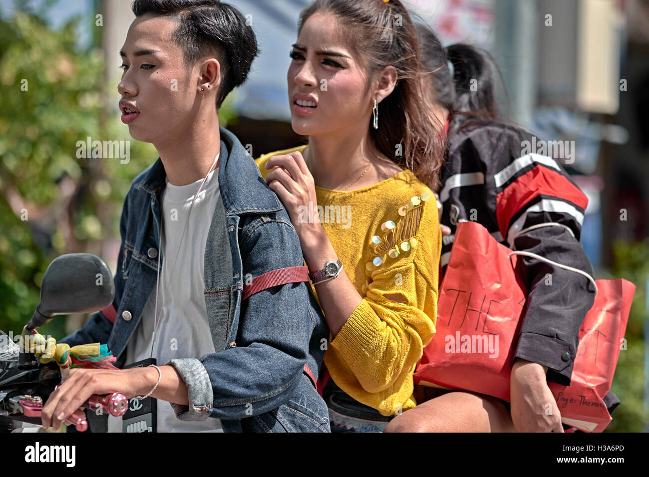 Male transgender and female companions riding a motorcycle. Thailand S ...