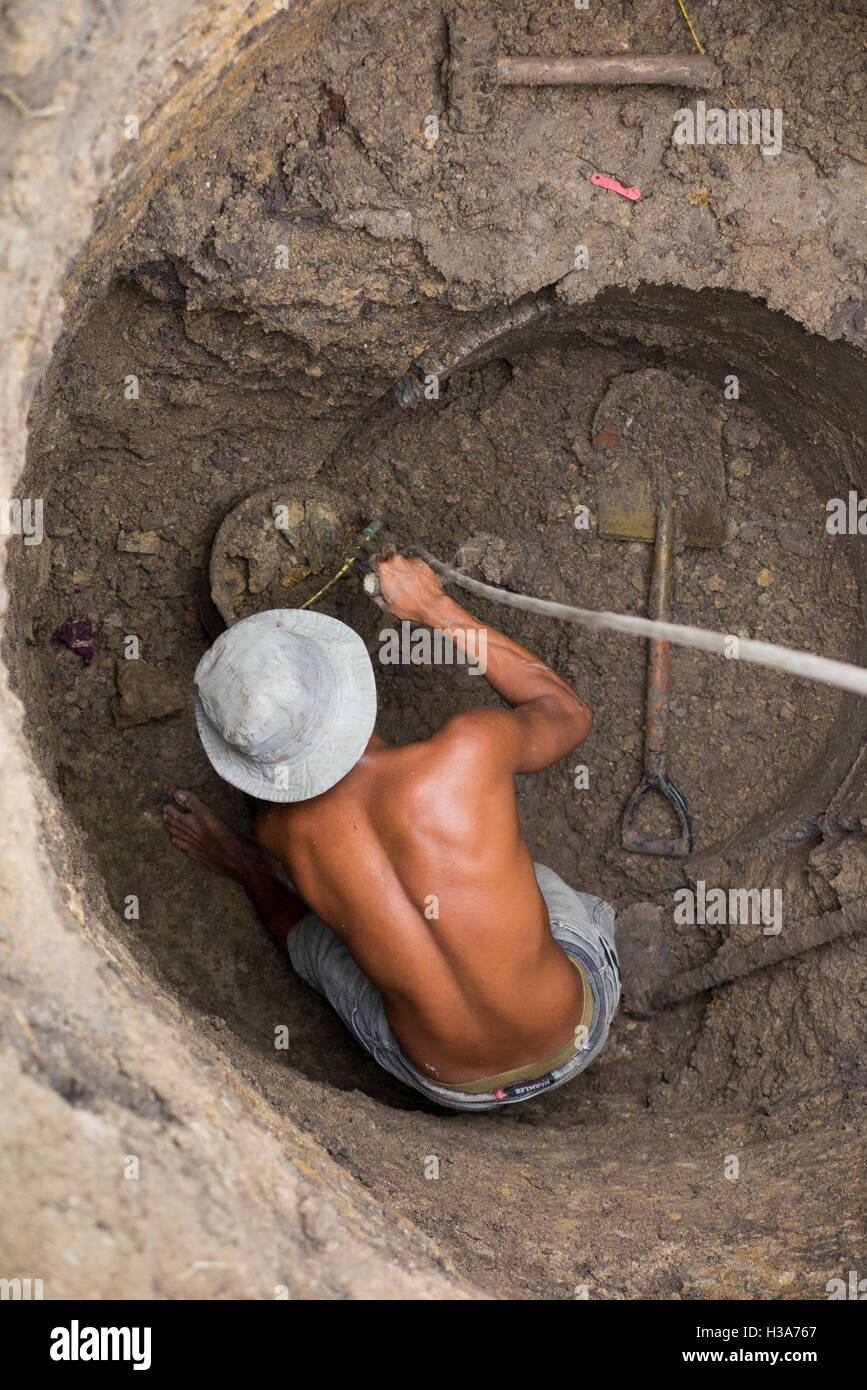 Hand digging well hi-res stock photography and images - Alamy