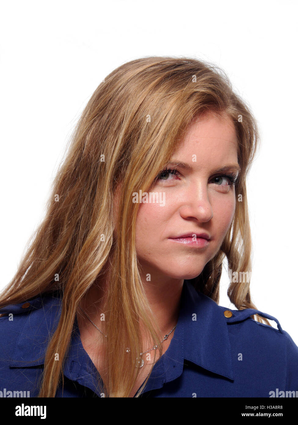 Unsmiling hi-res stock photography and images - Alamy