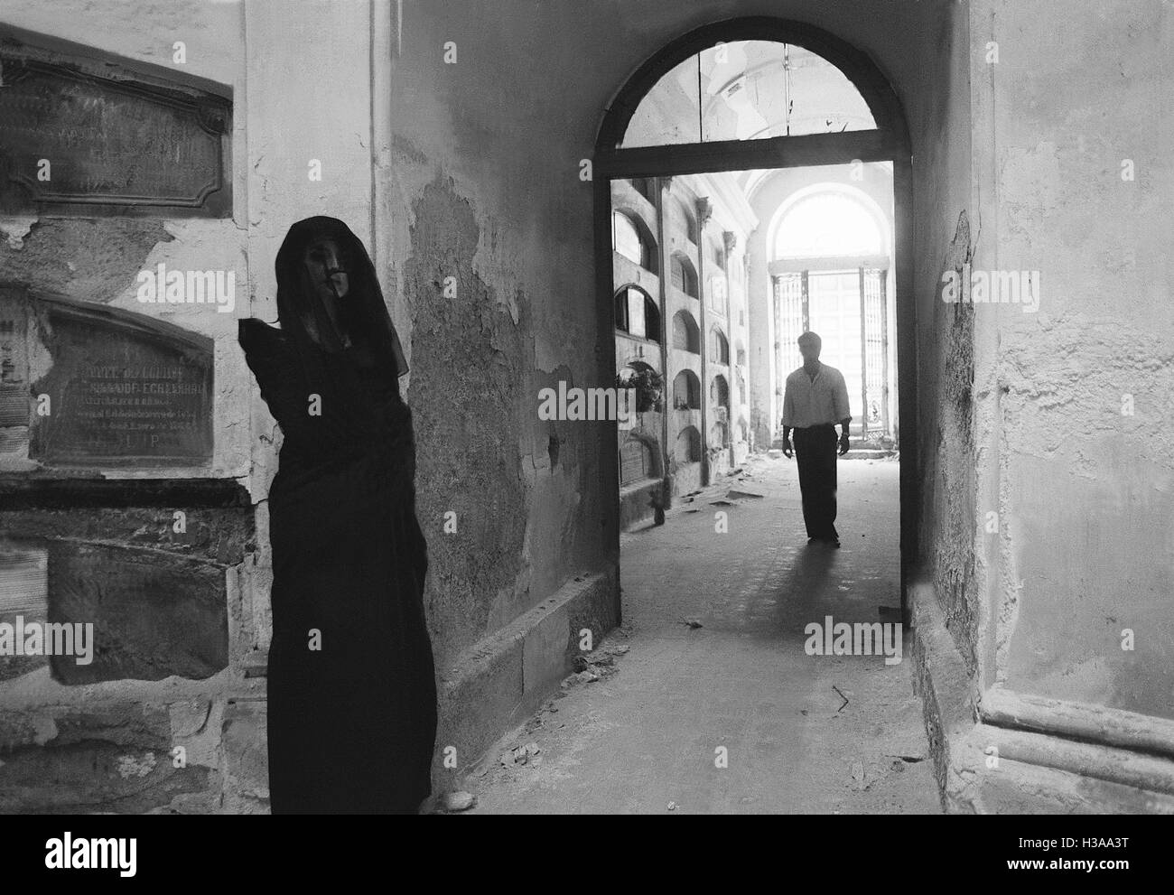 Apparition in the cemetery. Black and White Stock Photo - Alamy