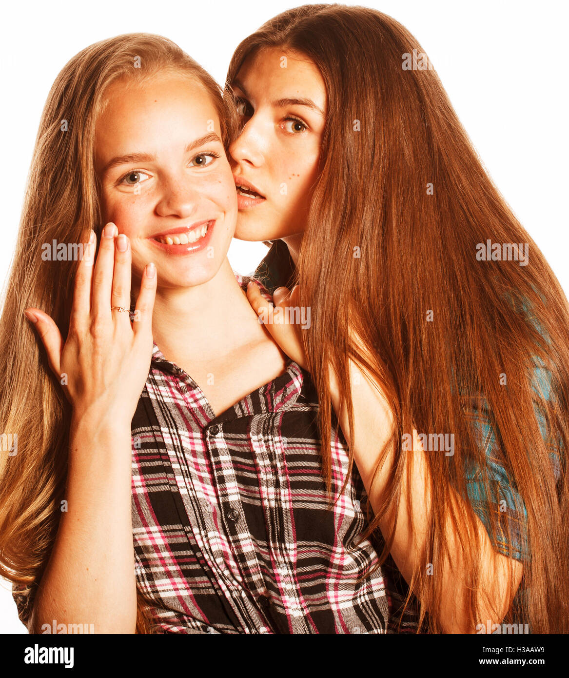 two cute teenagers having fun together isolated on white Stock Photo ...