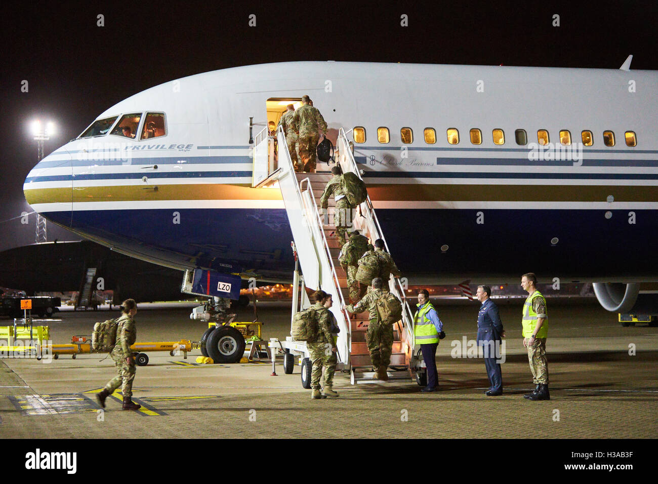 Army medics board a Boeing 767 for the flight to Freetown to help with ...