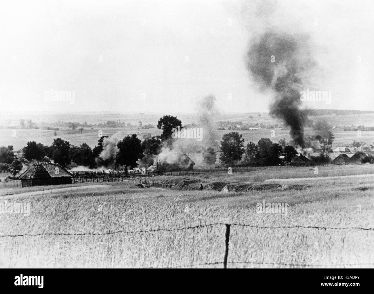 A Soviet village was set on fire during a battle, 1941 Stock Photo - Alamy
