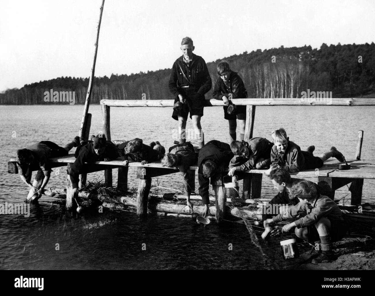 Pimpfe when washing their cookware, 1934 Stock Photo - Alamy