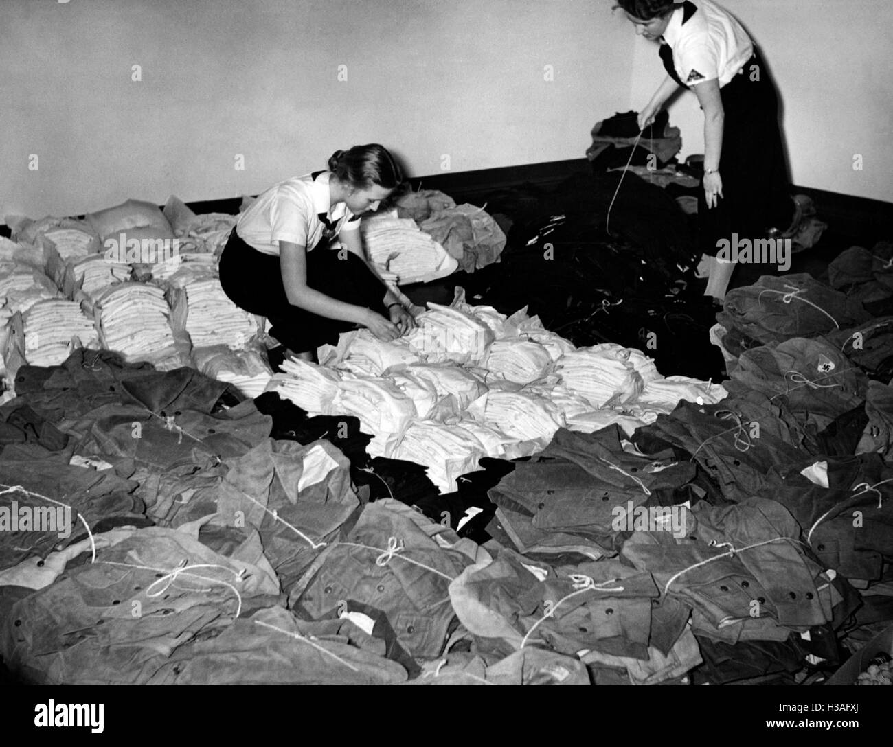 BDM uniforms for Austria, Berlin 1938 Stock Photo - Alamy