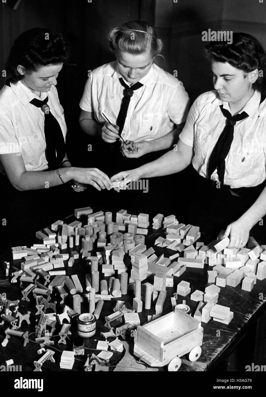 BDM girls making toys, 1939 Stock Photo - Alamy