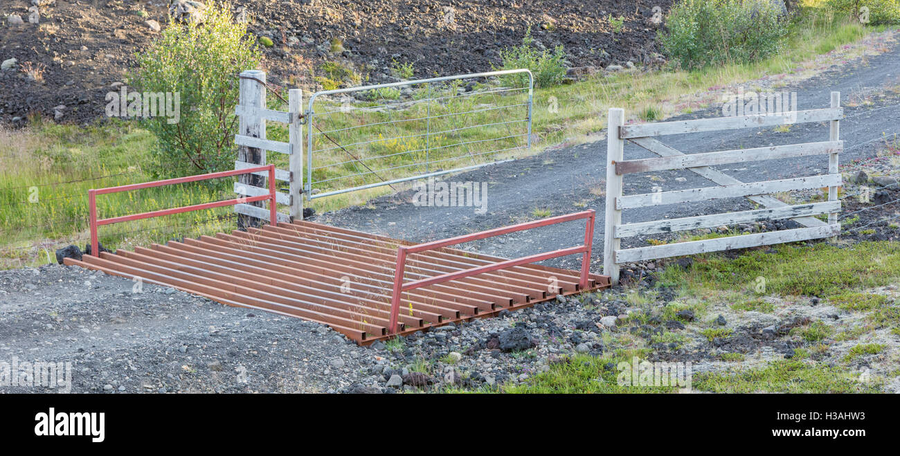 Cattle grid in the typical Icelandic landscape Stock Photo - Alamy