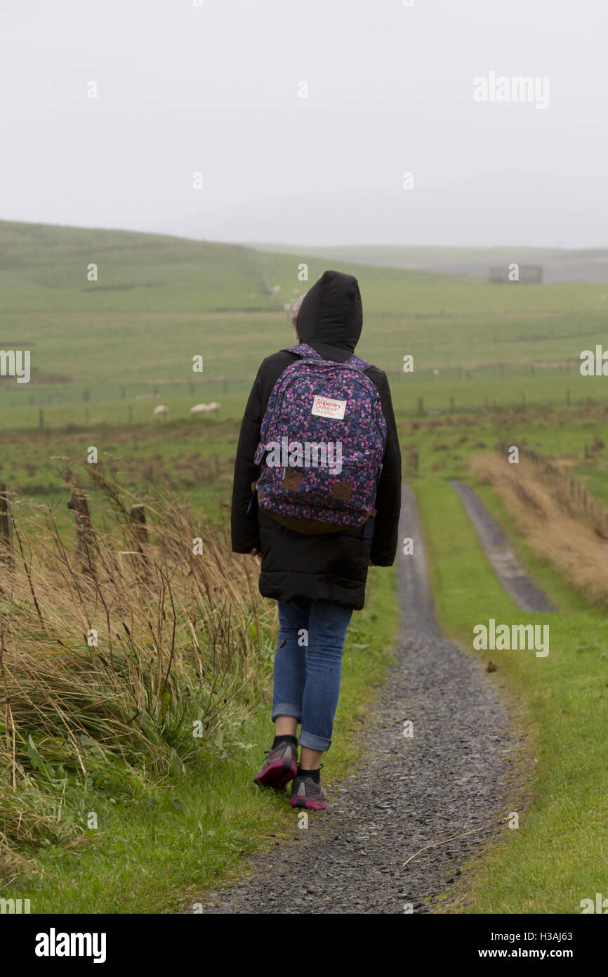Girl walking down lane hi-res stock photography and images - Alamy