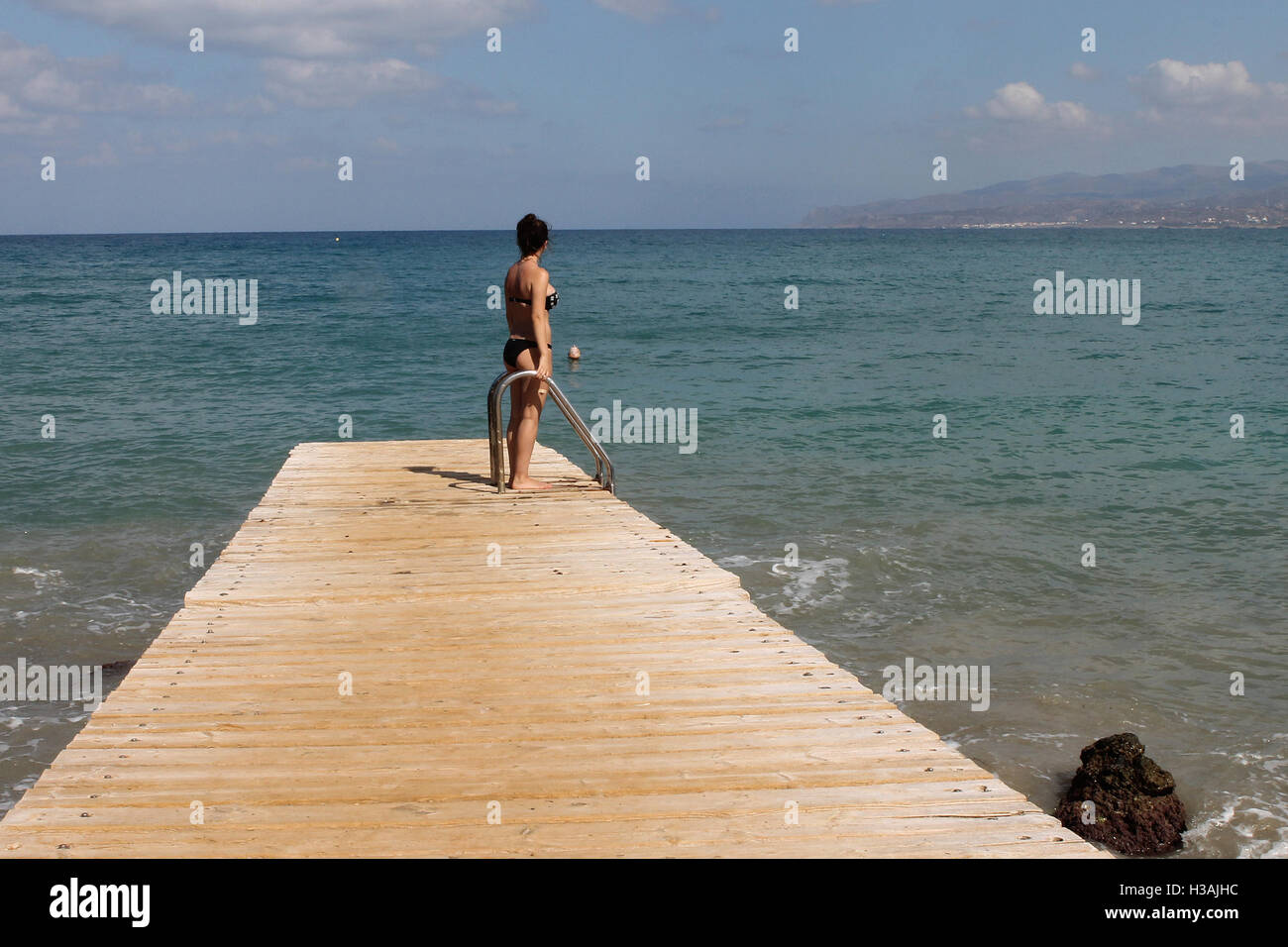 Jetty off the coast of Stalida Stalis Crete Greece Stock Photo - Alamy