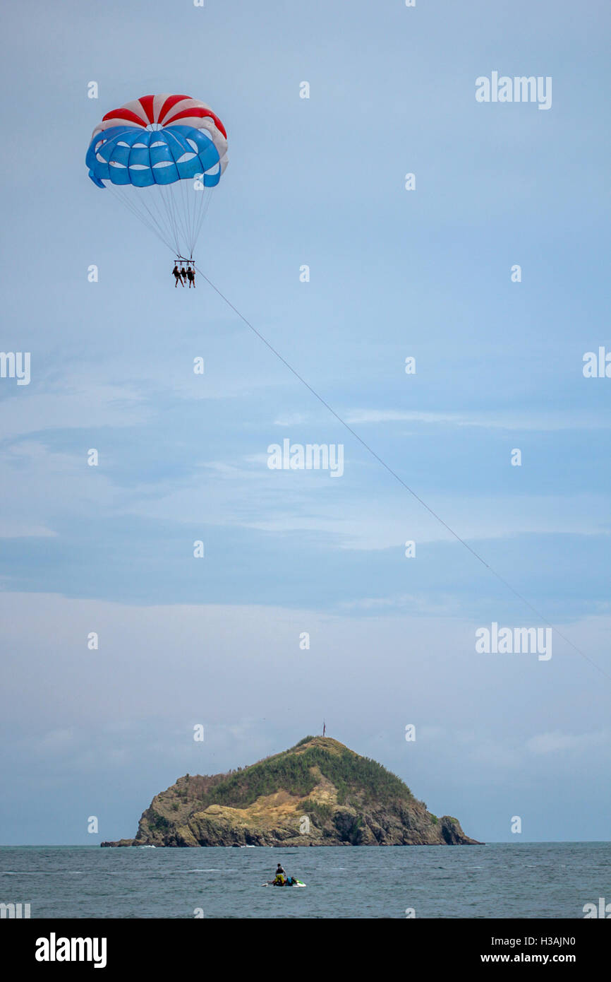 ROcks inside the blue ocean Stock Photo - Alamy