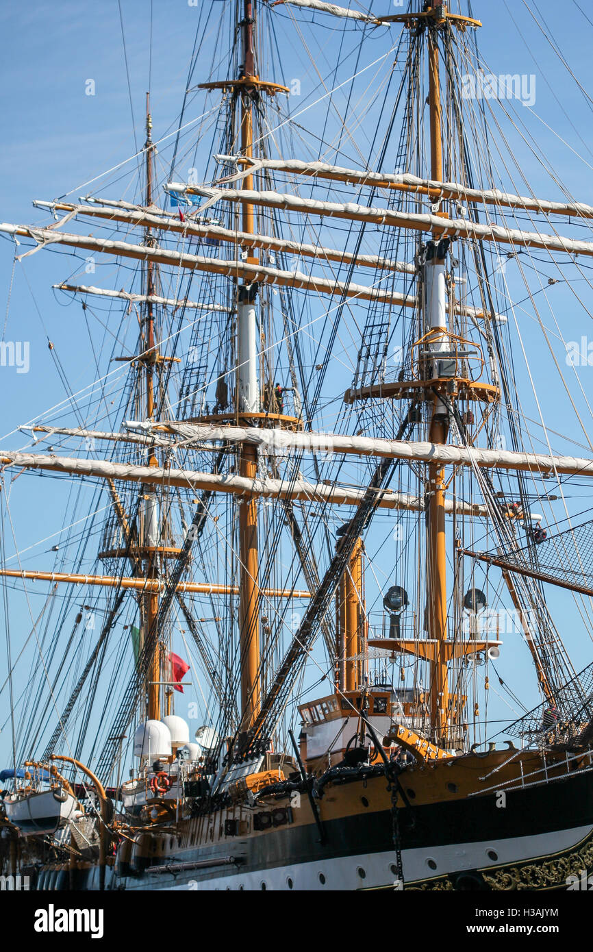 Beautiful tall wooden antique war ship at the harbor loading and ...