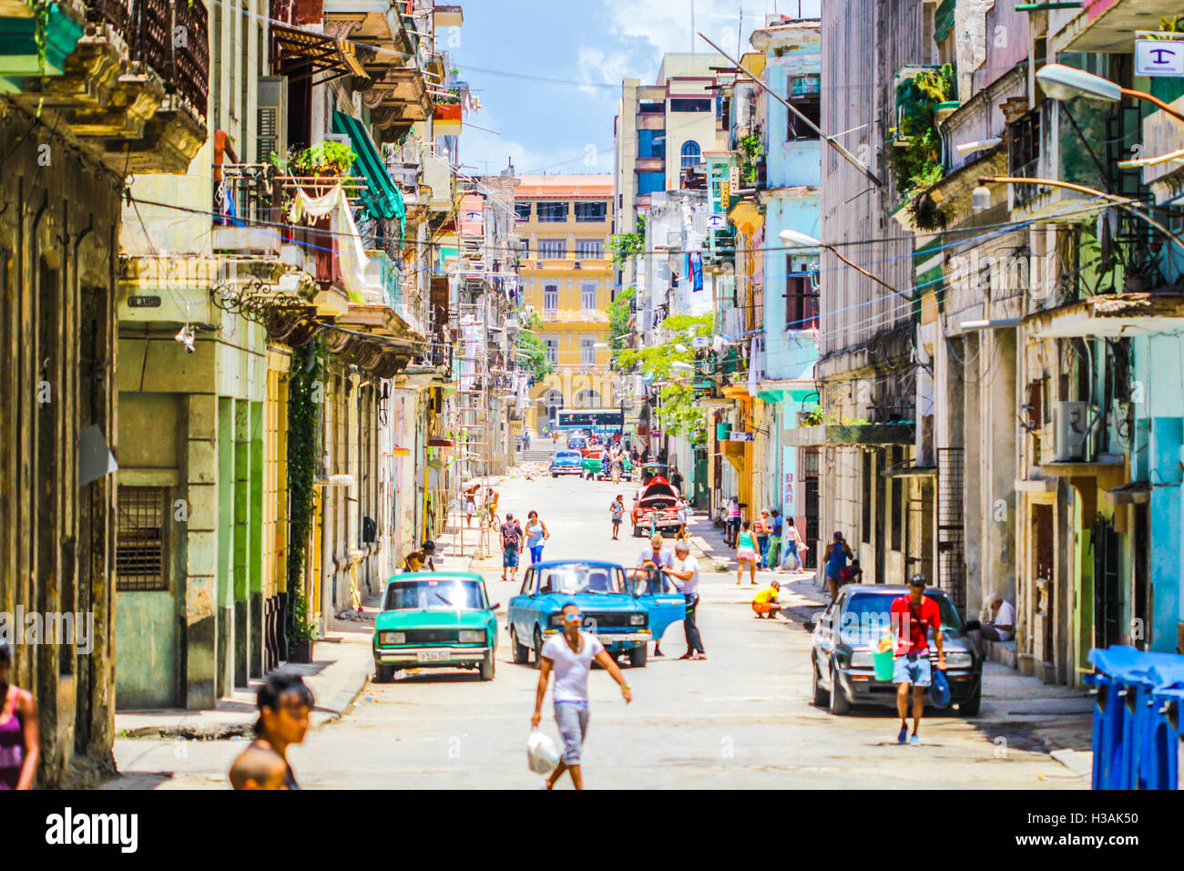 Vibrant life in Cuba Havana, groups of people families friends enjoying ...
