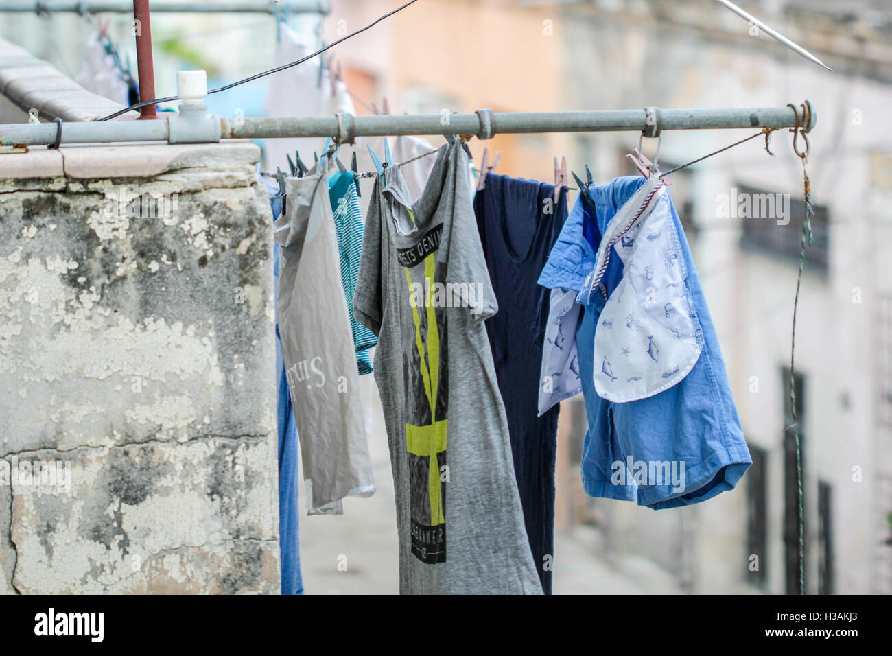 Drying clothes in the balcony Stock Photo - Alamy