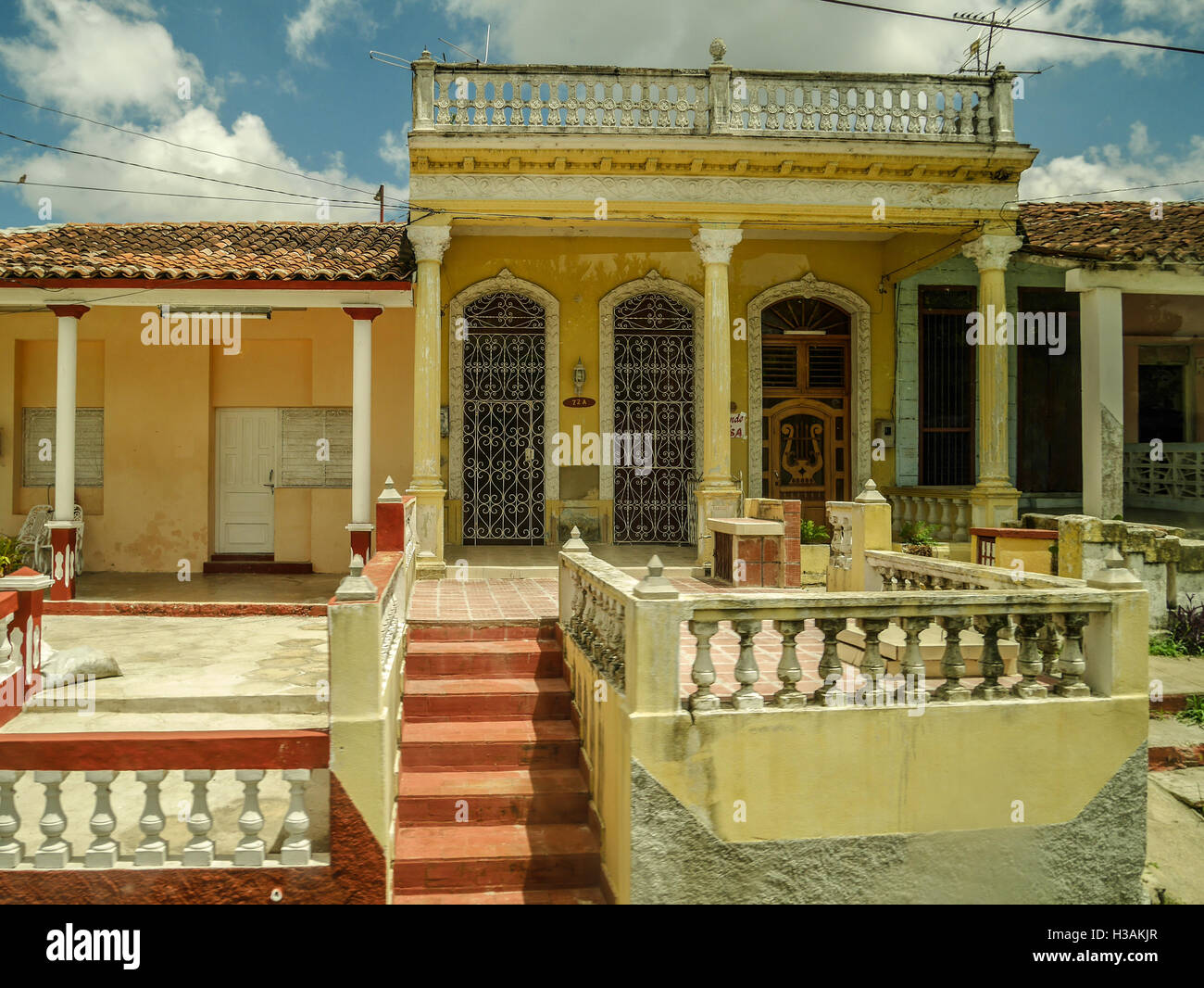 Private simple low budget colorful houses in Cuba Stock Photo - Alamy