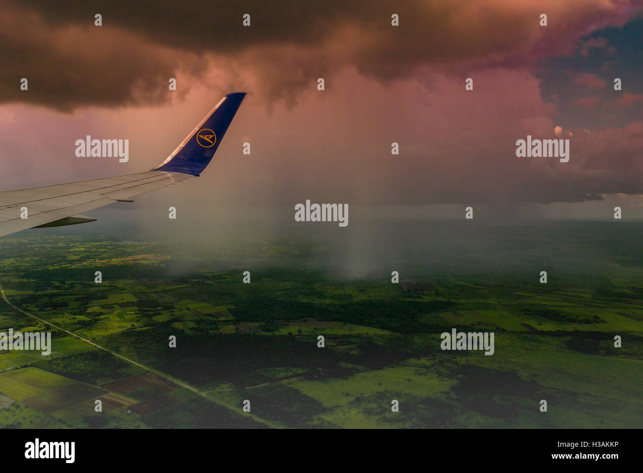 View from airplane window of rain Stock Photo - Alamy