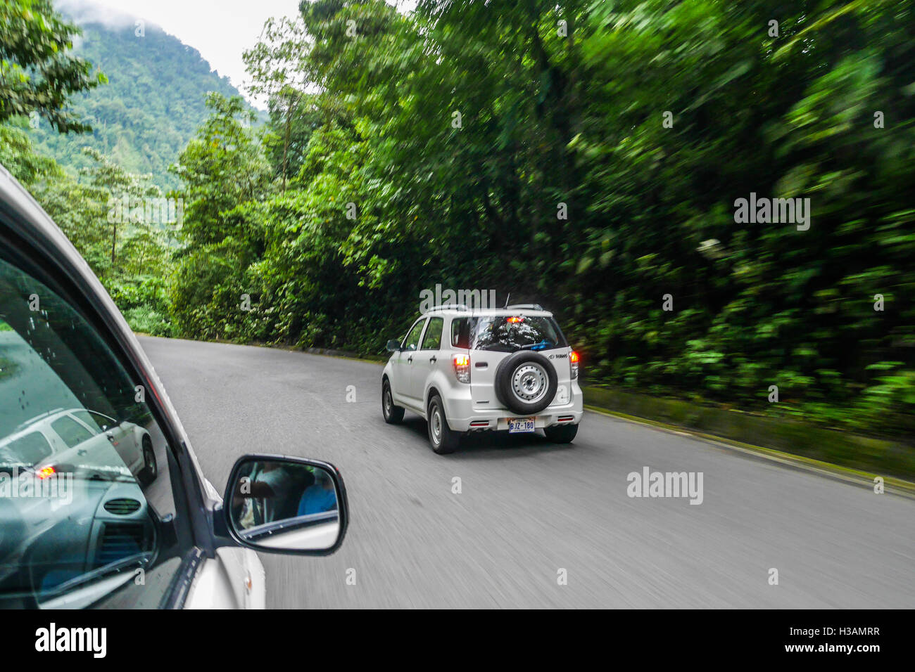 A Road With Cars Passing One Another Stock Photo - Alamy
